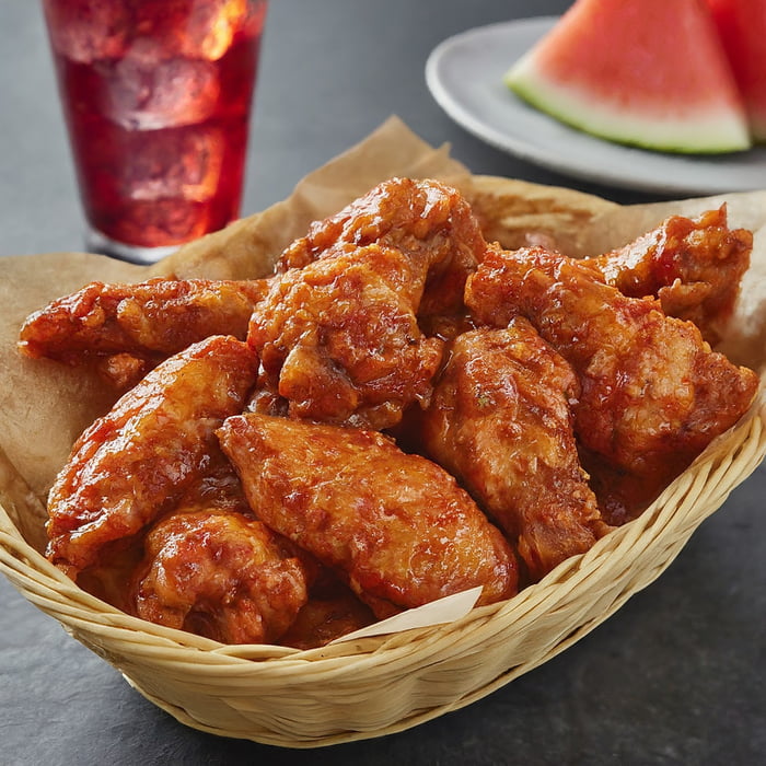 Fried chicken wings with hot sauce, watermelon, and grape juice. - 9GAG
