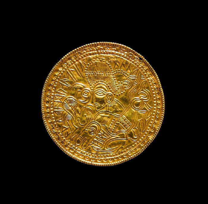 Gold bracteate found on funen in Denmark. It dates back to the 4th or ...