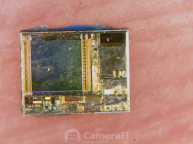 Small chip inside a SIM card, captured with $10 USB microscope - 9GAG