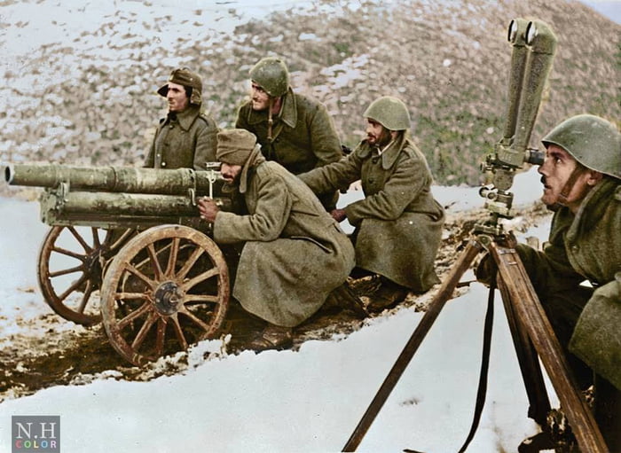 Greek soldiers firing a 65 mm Mle 1906 mountain gun against Italian ...
