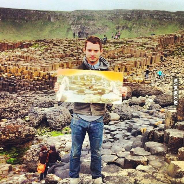 Elijah Wood, holding Led Zeppelin's Houses Of the Holy Vinyl at Giant's Causeway, the place ...