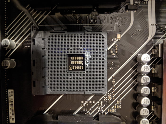 Got thermal paste in CPU socket HELP - 9GAG