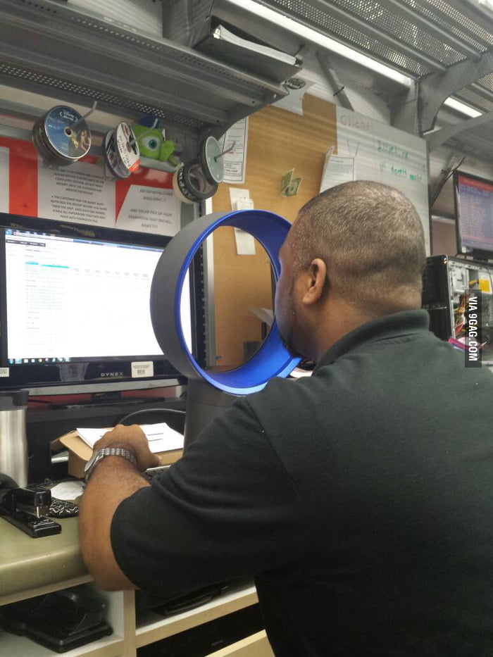 This is how you use a Dyson fan in a hot office. - 9GAG