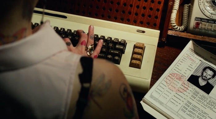In John Wick 2, a Commodore 64, launched Aug, 1982, 64 KB RAM + 20 KB ...