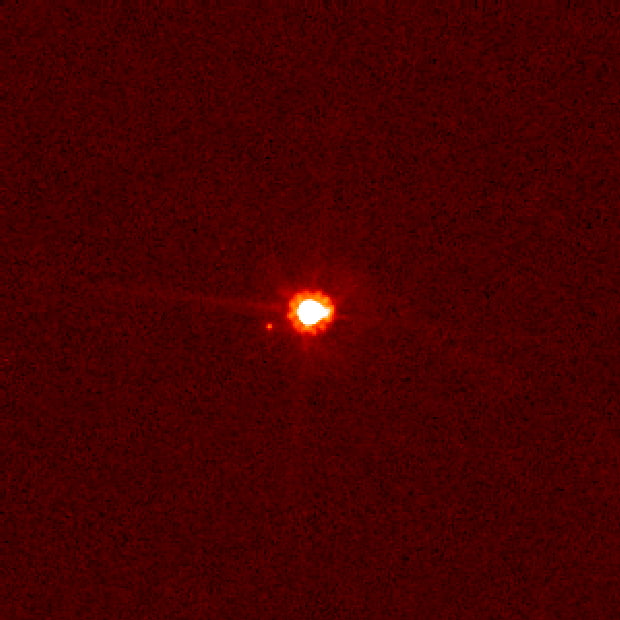 Photo of the dwarf planet Eris and its moon Dysnomia. Eris is (so far ...