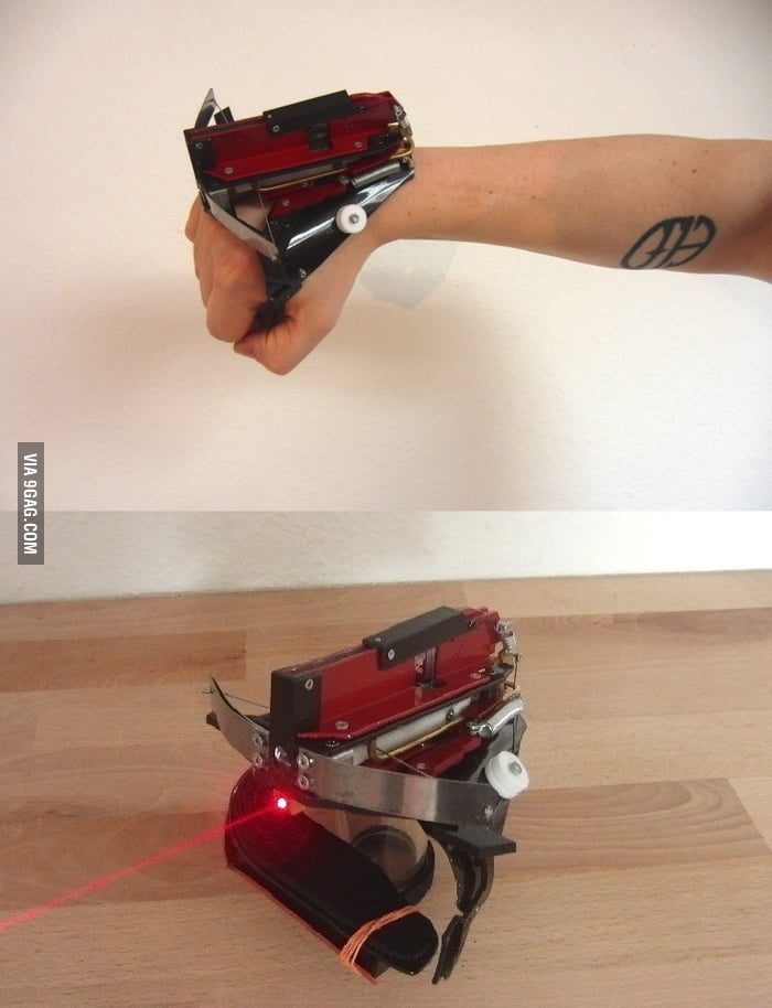 Wrist Mounted Crossbow... Semi Automatic with 8 shot clip and laser targeting for fun! - 9GAG