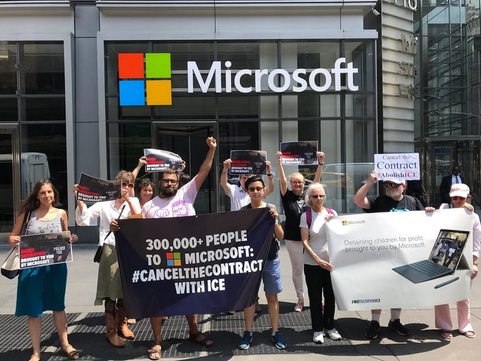 A Small Crowd Strike in front of Microsoft offices or something - 9GAG