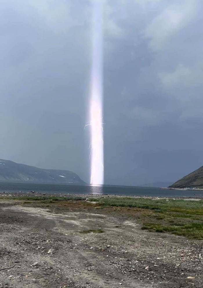 A huge lightning pole seen above Kangiqsualujjuaq in Nunavik, Quebec ...