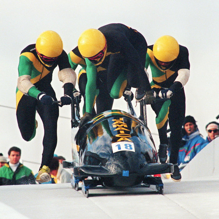 The Jamaican national bobsledding team competes at the 1988 Winter ...