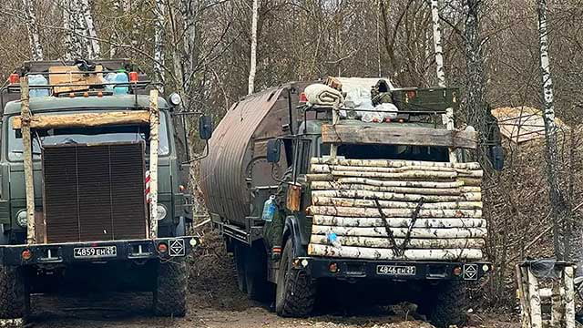 Russian military trucks with improvised tree trunk armor, Ukraine 2023 ...