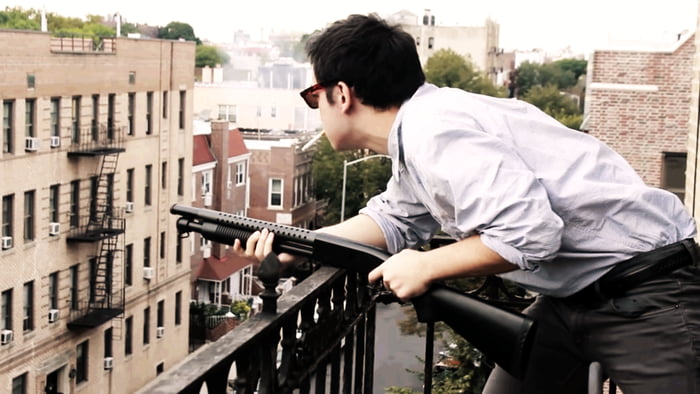 A "Rooftop Korean" defending his store from his balcony upstairs during ...