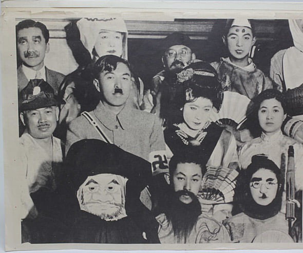 Prince Fumimaro Konoe dressed as Adolf Hitler during a party, 1937. He ...
