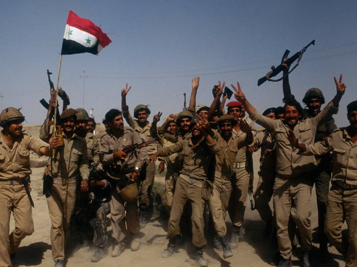 Iraqi soldiers celebrating their advance in the invasion of Iran on ...