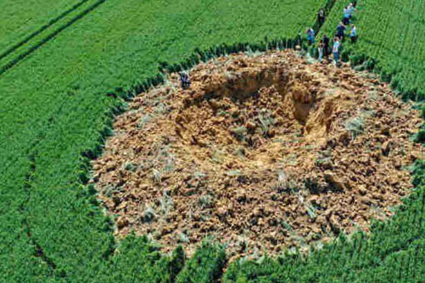 Crater from 250 kilo WW2 bomb which detonated last weekend in a farmer ...