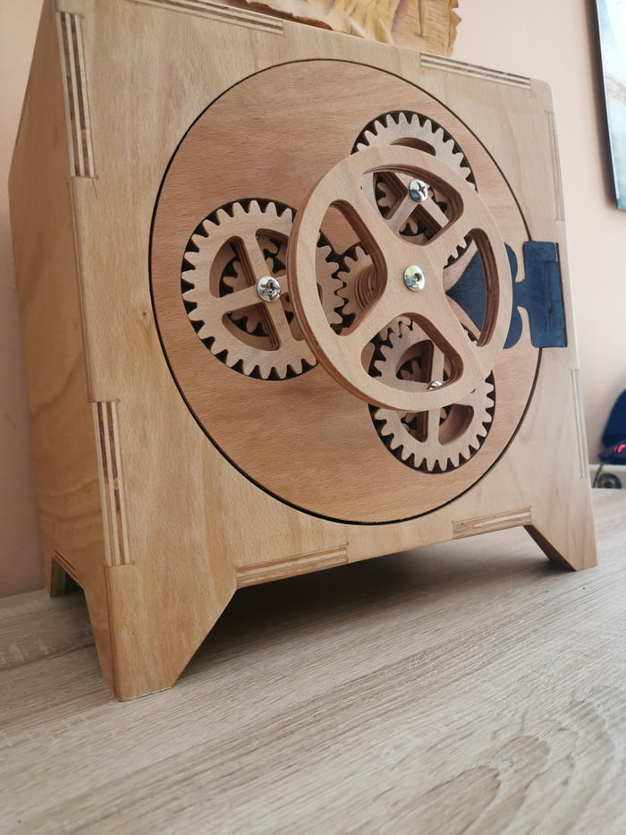 Made this mechanical wooden box that locks using a gear lock mechanism ...
