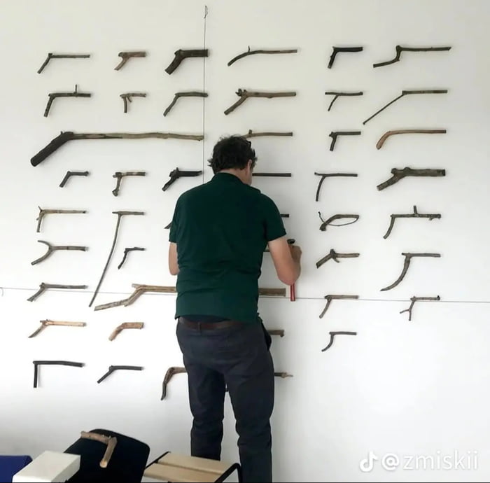 This guy is a gun collector made from sticks. what a higher life form ...