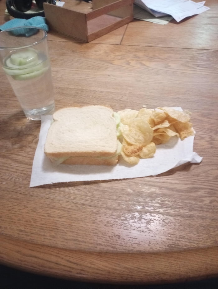 Lunch today. cucumber sandwich with Tim's potato chips and some ...