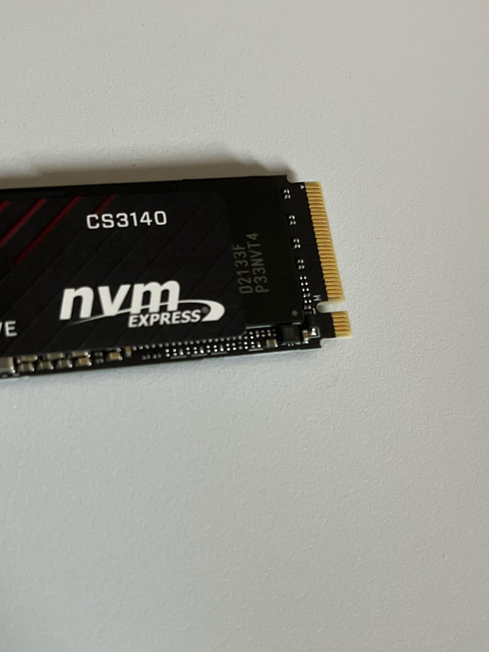 Question when you install a ssd card do the sticker stay on the top and ...