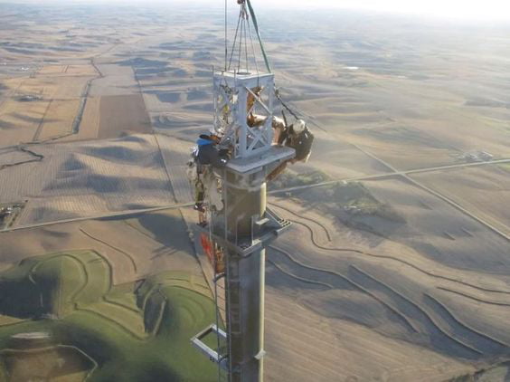 Working on a candelabra tower, 600 meters over the ground. - 9GAG