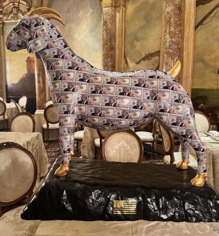 Golden-hoofed goat statue covered in $100 bills with Trump's face is ...