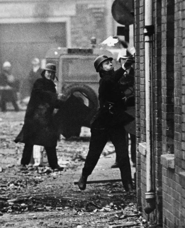 Troubles photo a day, RUC Riot officer throws petrol bomb into a ...