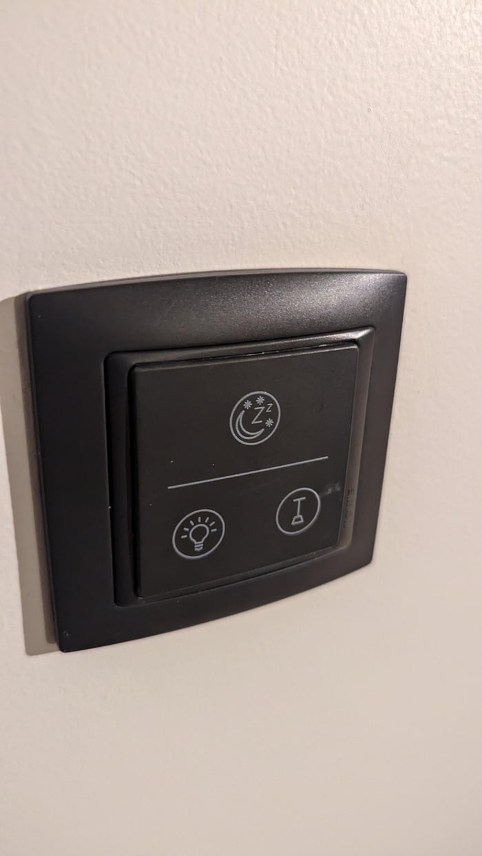 A fancy light switch with no way to feel each button or even know which ...