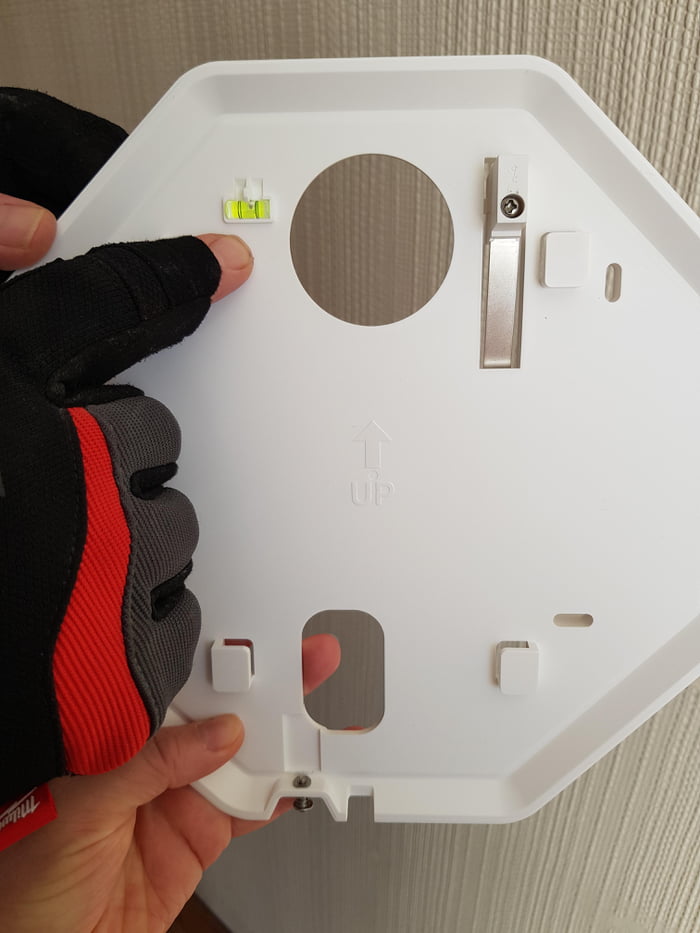 This wall mount has a tiny in built spirit level - 9GAG