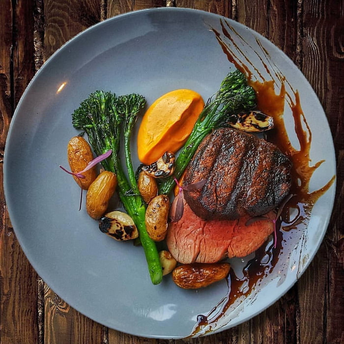 Oak grilled beef, carrot-beef fat emulsion, charred broccoli and a ...