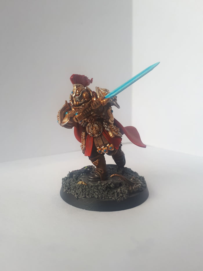 Finished up my custodes blade champion, one of my favorite models so ...