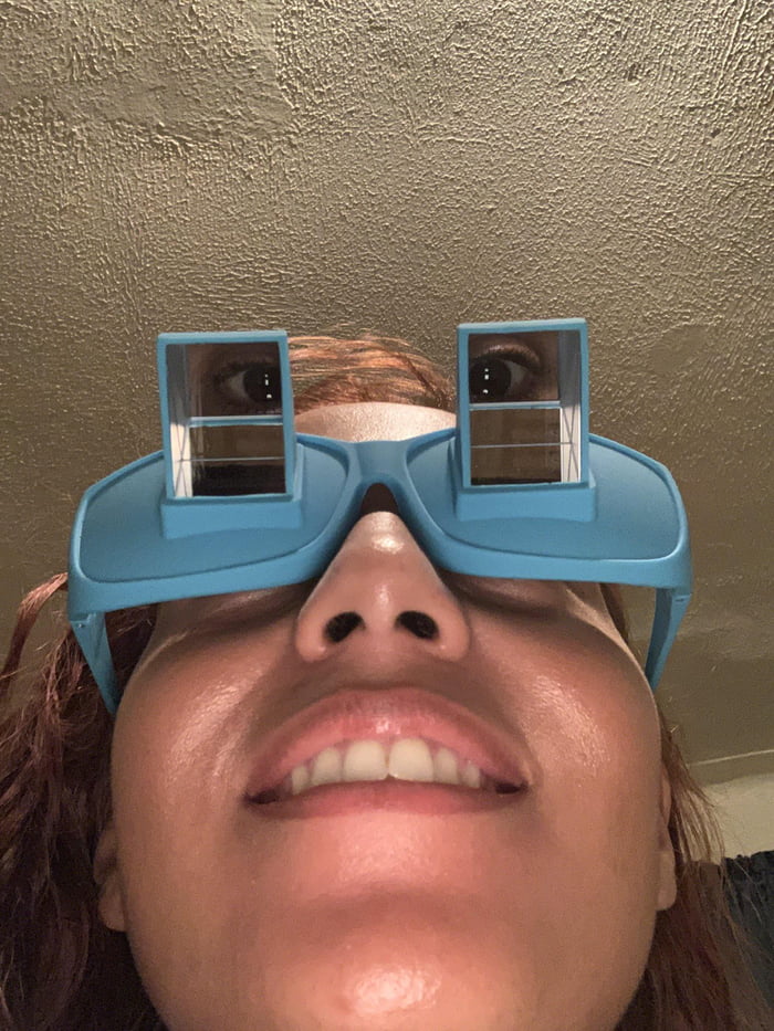 Prism Glasses allows you to read while laying down - 9GAG
