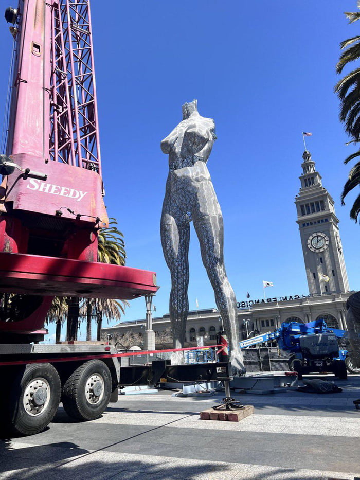45 foot tall statue of a nude woman being erected at the Embarcadero in ...